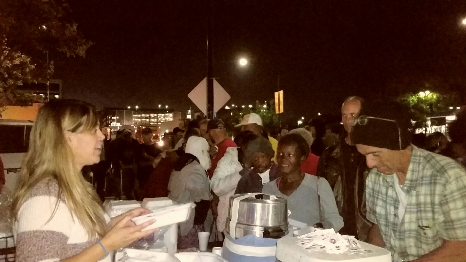 Suzy passing out food plates to San Diego's homeless for Thanksgiving ...