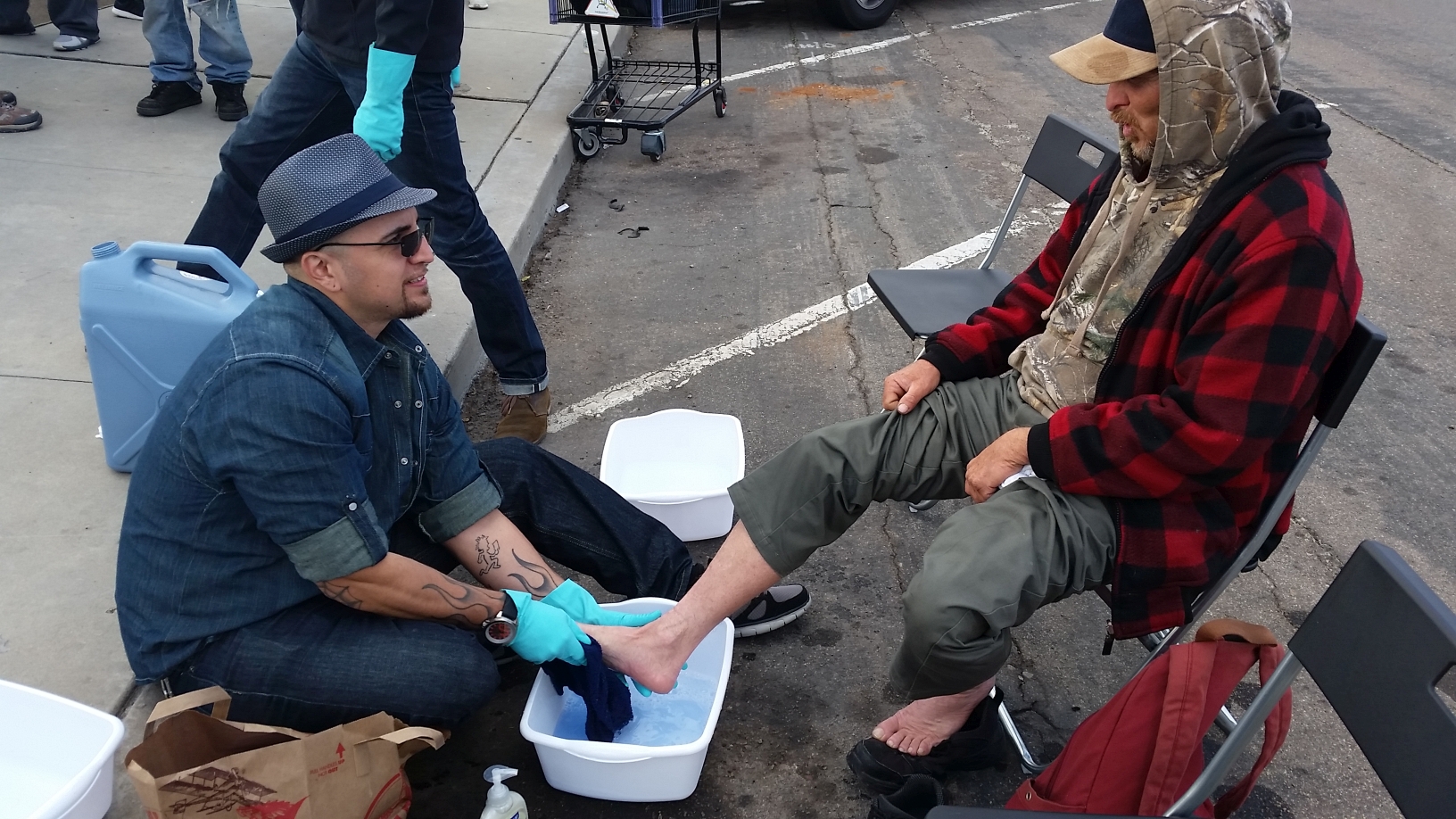 Washing a homeless man's feet at our Easter event in downtown San Diego ...